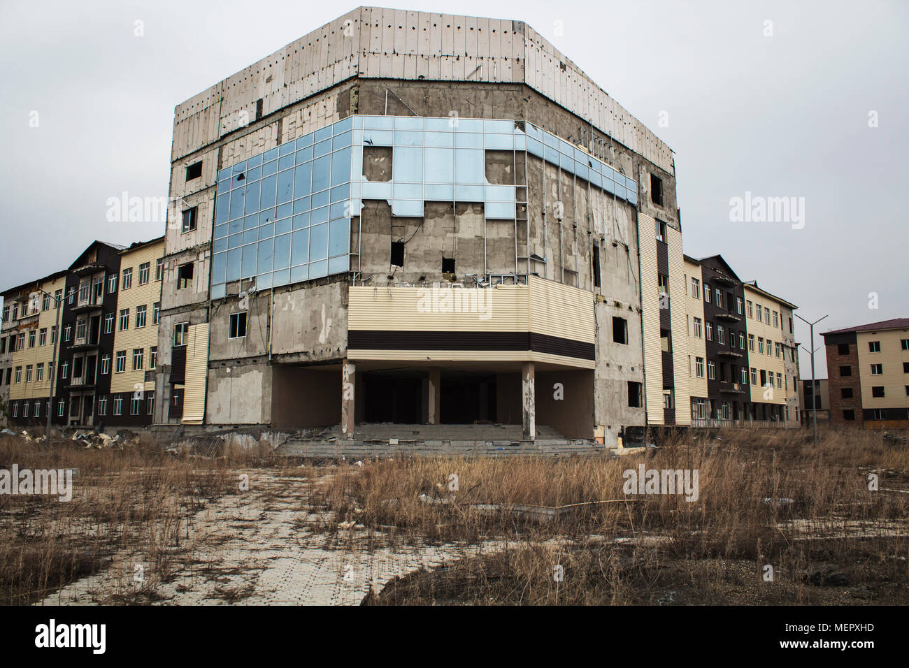 Abandoned construction. Unfinished building. Grunge landscape Stock ...