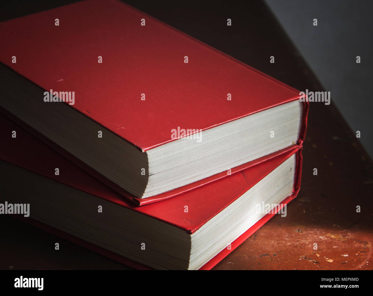 Two red books on the table. Red book Stock Photo - Alamy