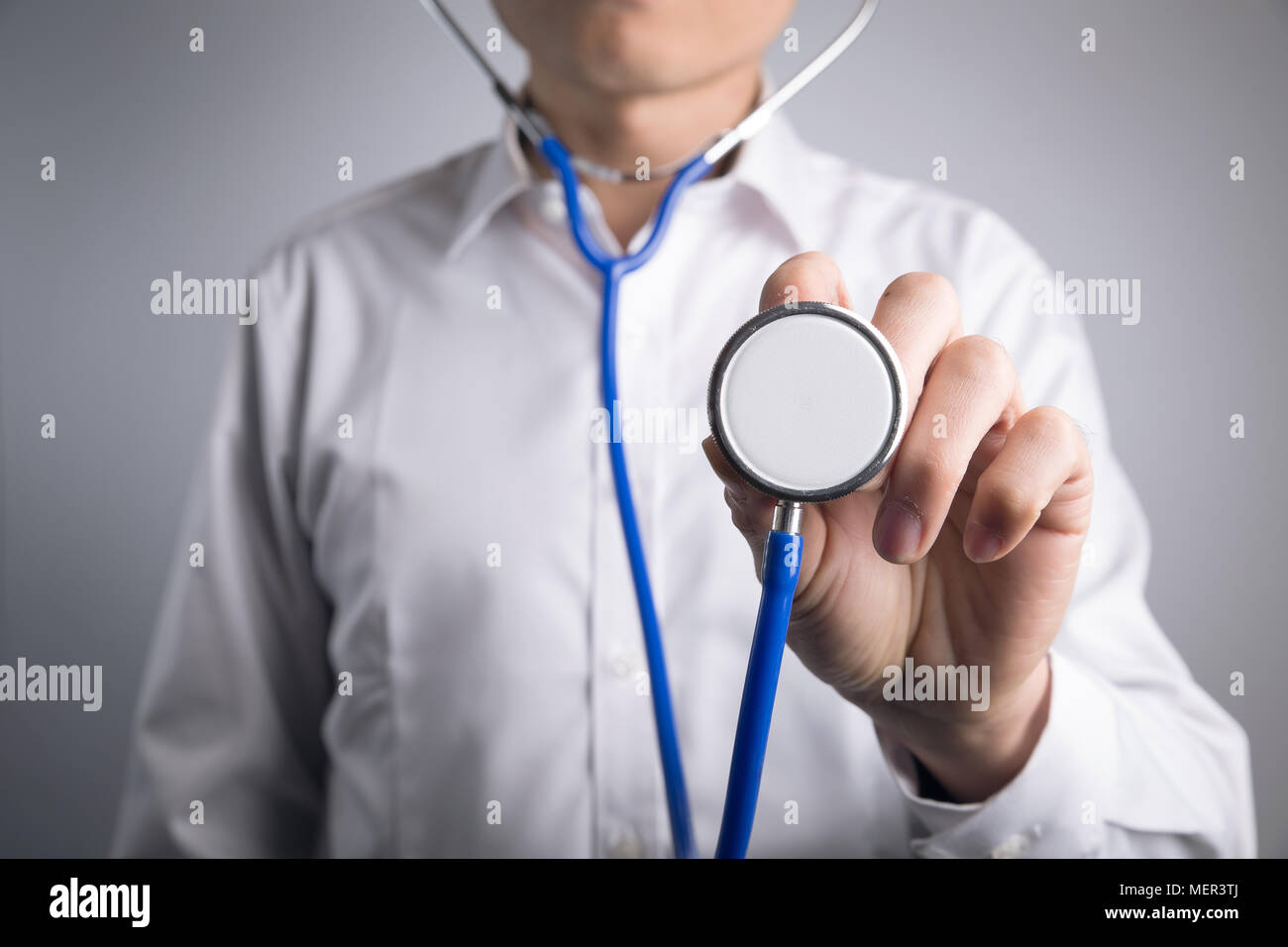 With a stethoscope in hand hi-res stock photography and images - Alamy