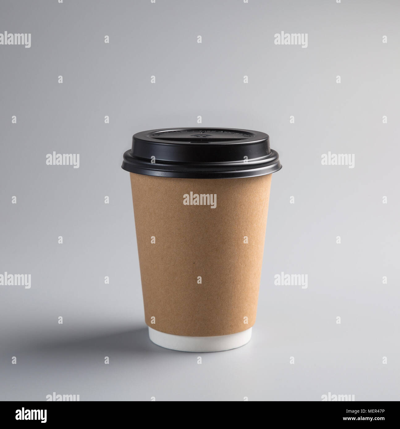 cardboard cup with lid on the table Stock Photo - Alamy