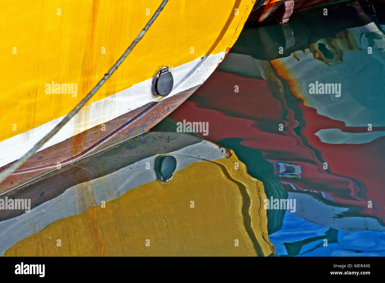 Boat reflections in the still waters of Scarborough harbour Stock Photo ...