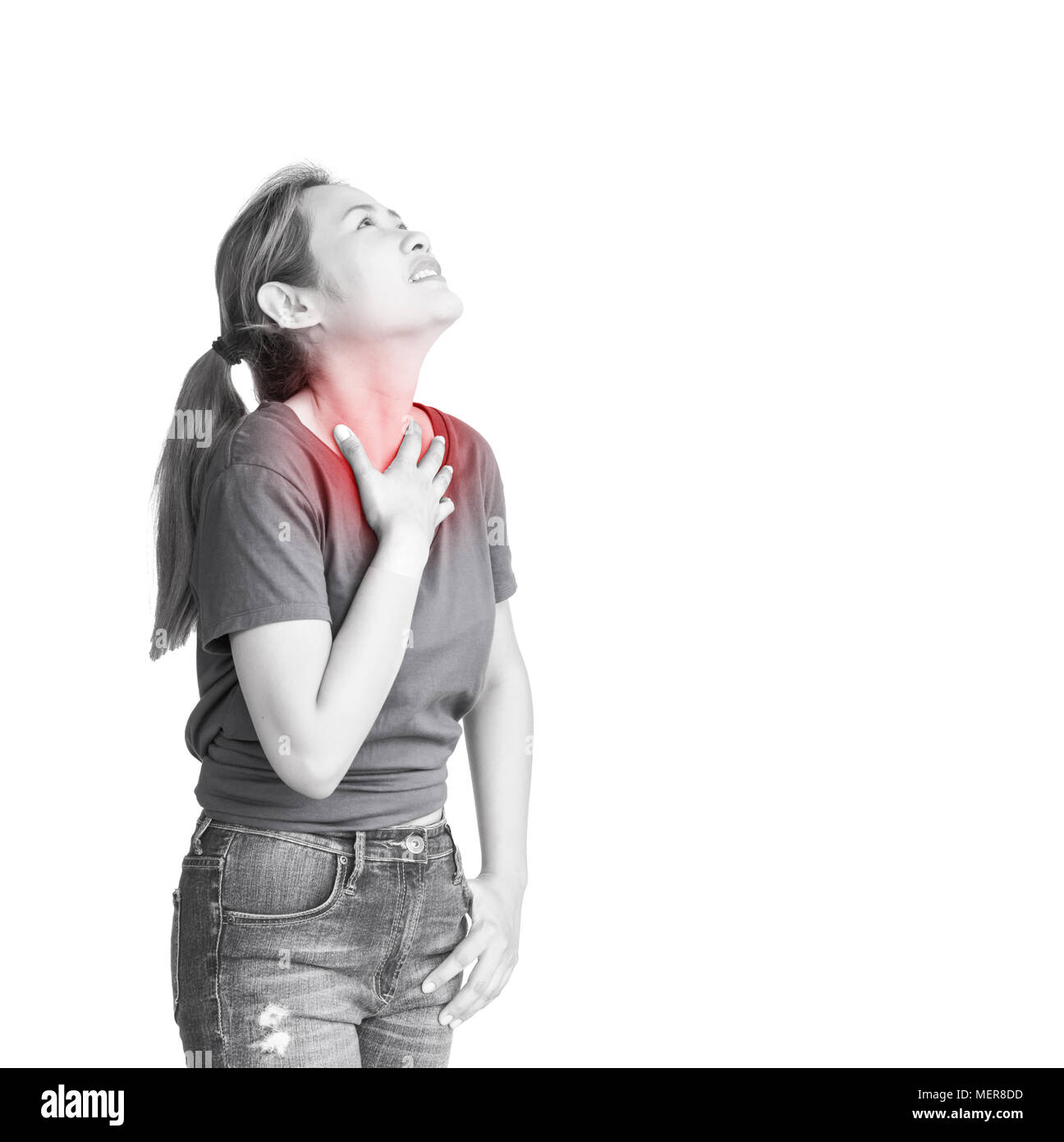 Young asian woman suffering form acid reflux or heartburn with red ...