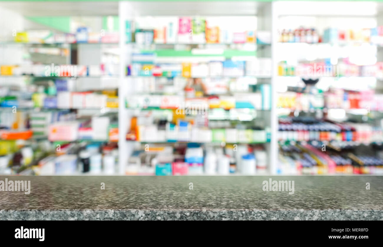 Marble tabletop with blurred of medicine background use for drugs or ...