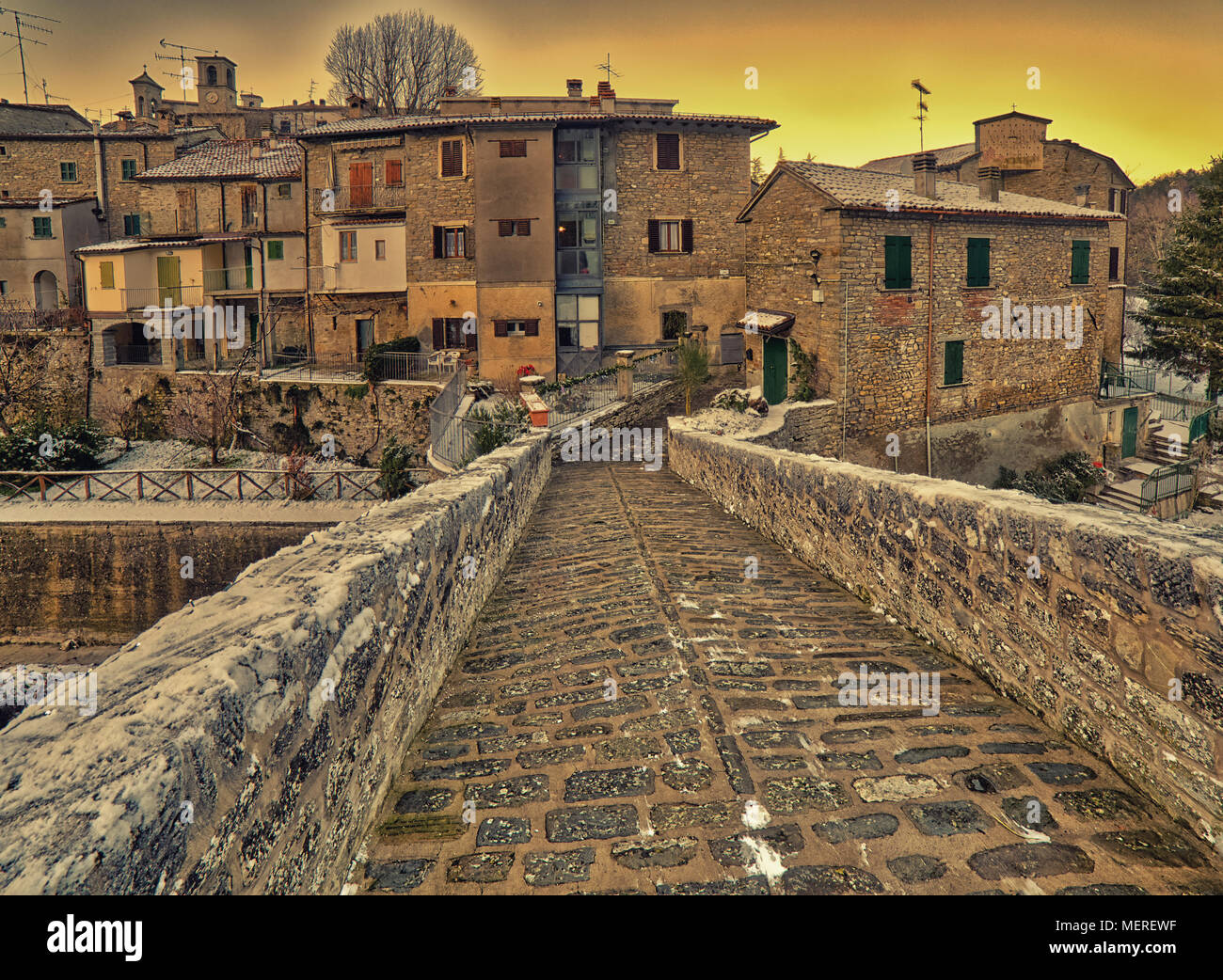 Ancient medieval donkey-back bridge with a unique arch in a village in ...