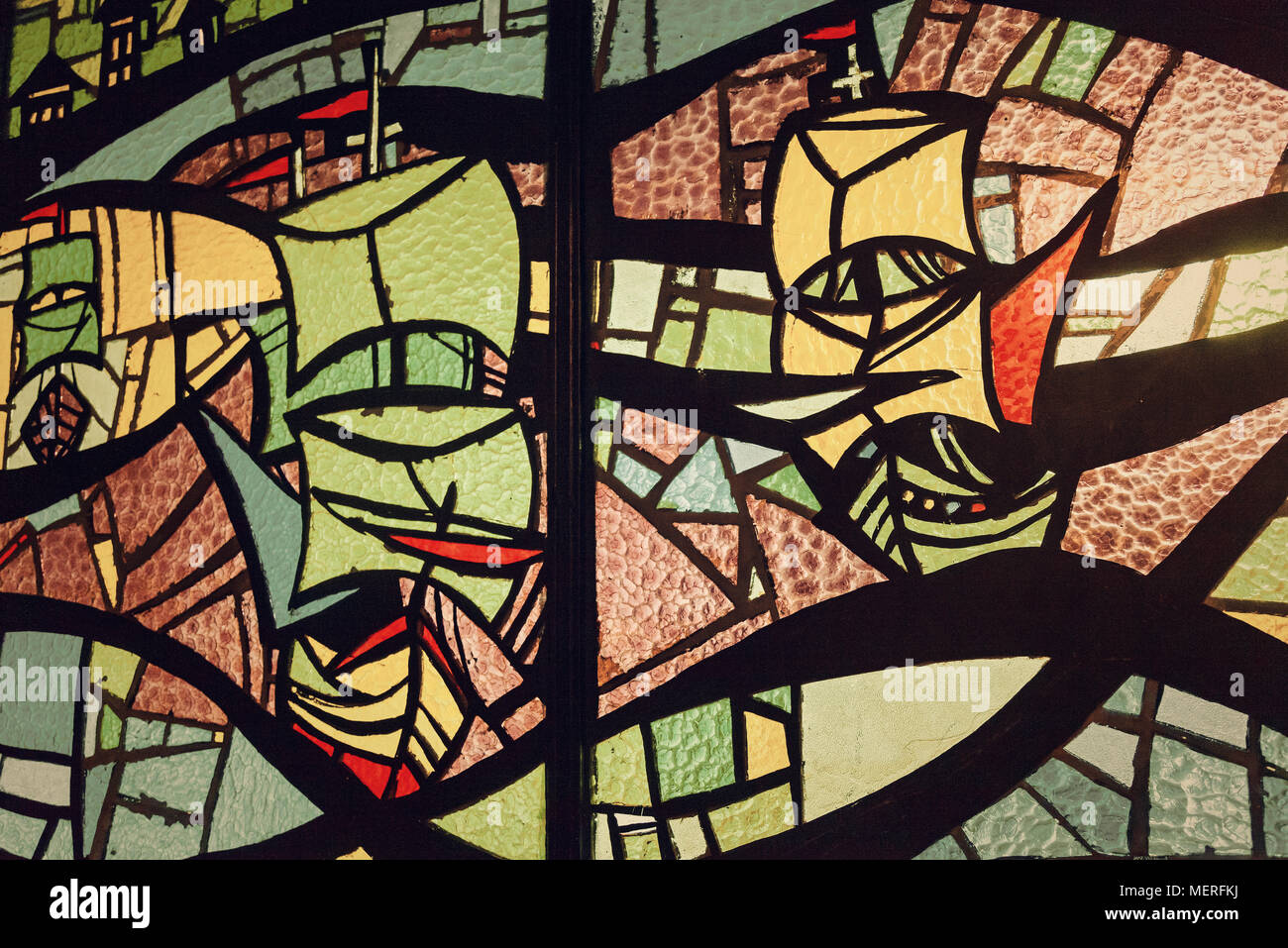 Image of a multicolored stained glass window with irregular block ...