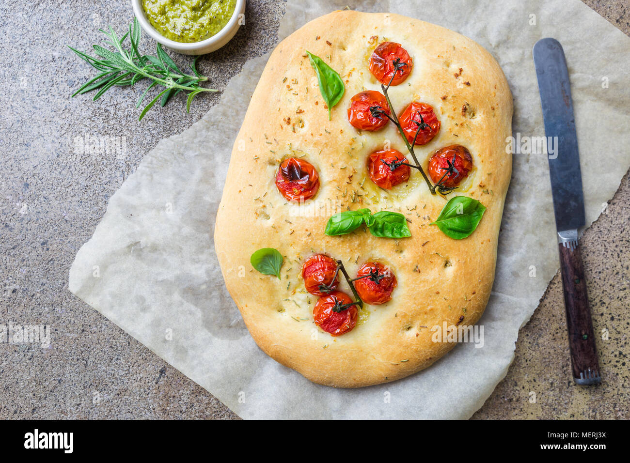 Traditional Italian Focaccia with tomatoes and rosemary - homemade flat ...