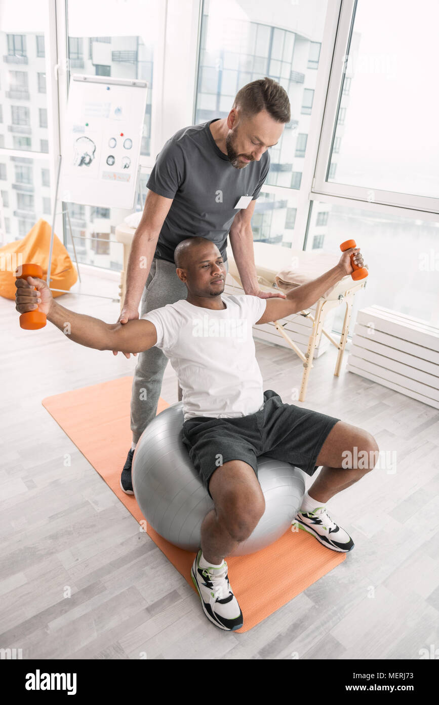 Man leaning back hi-res stock photography and images - Alamy