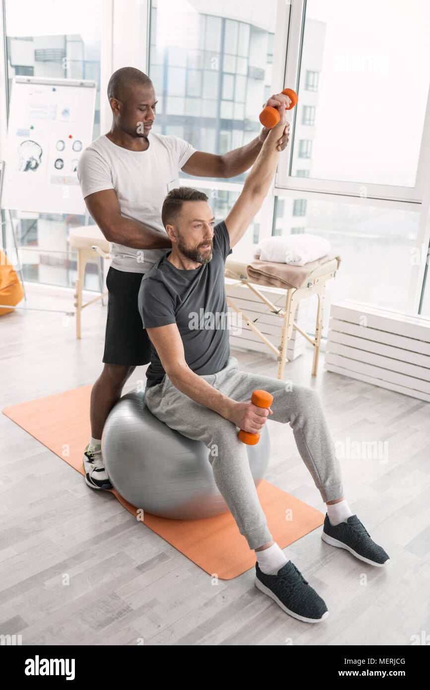 Smart nice man working out Stock Photo - Alamy