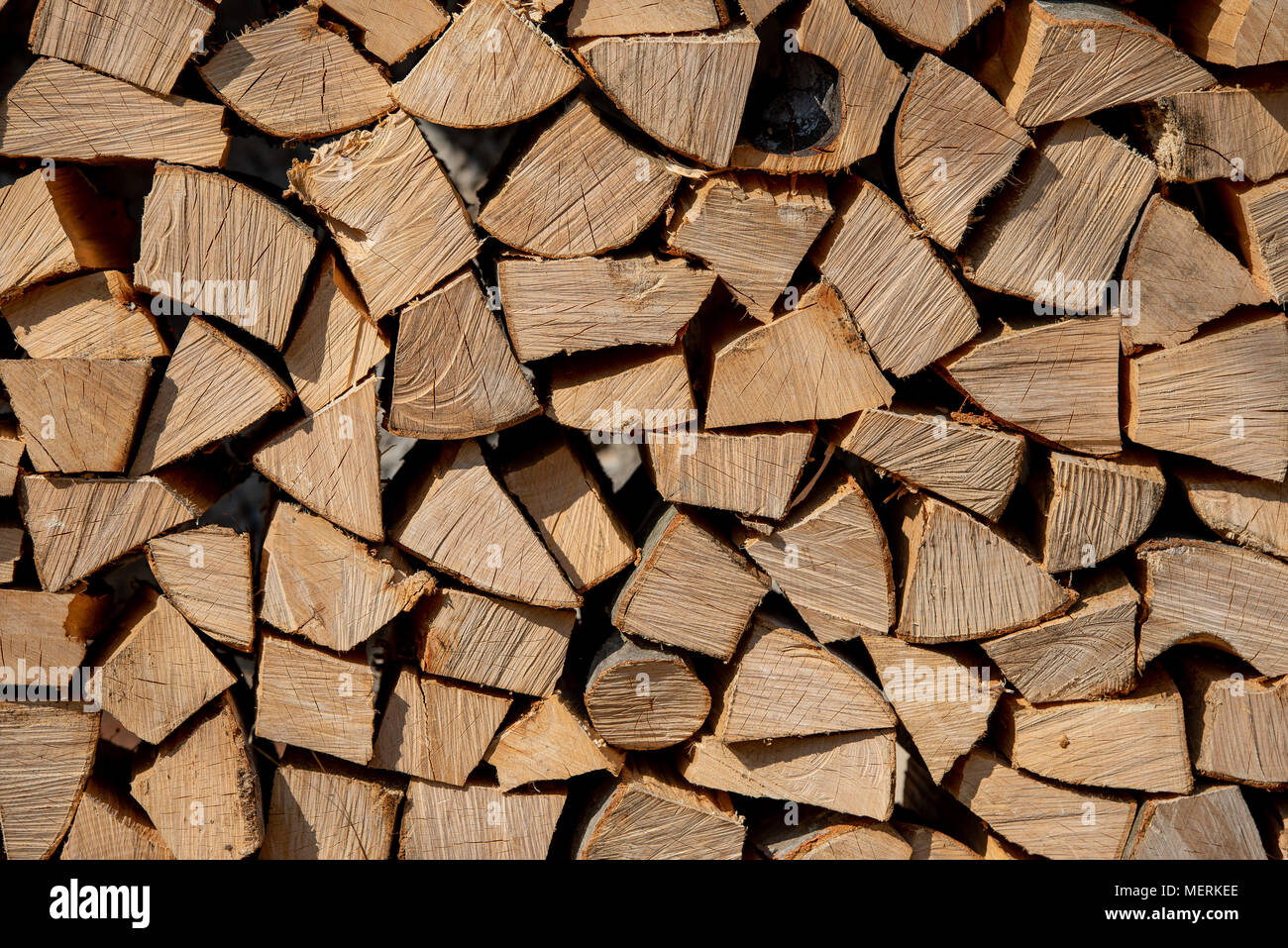 wood logs stacked with order Stock Photo - Alamy