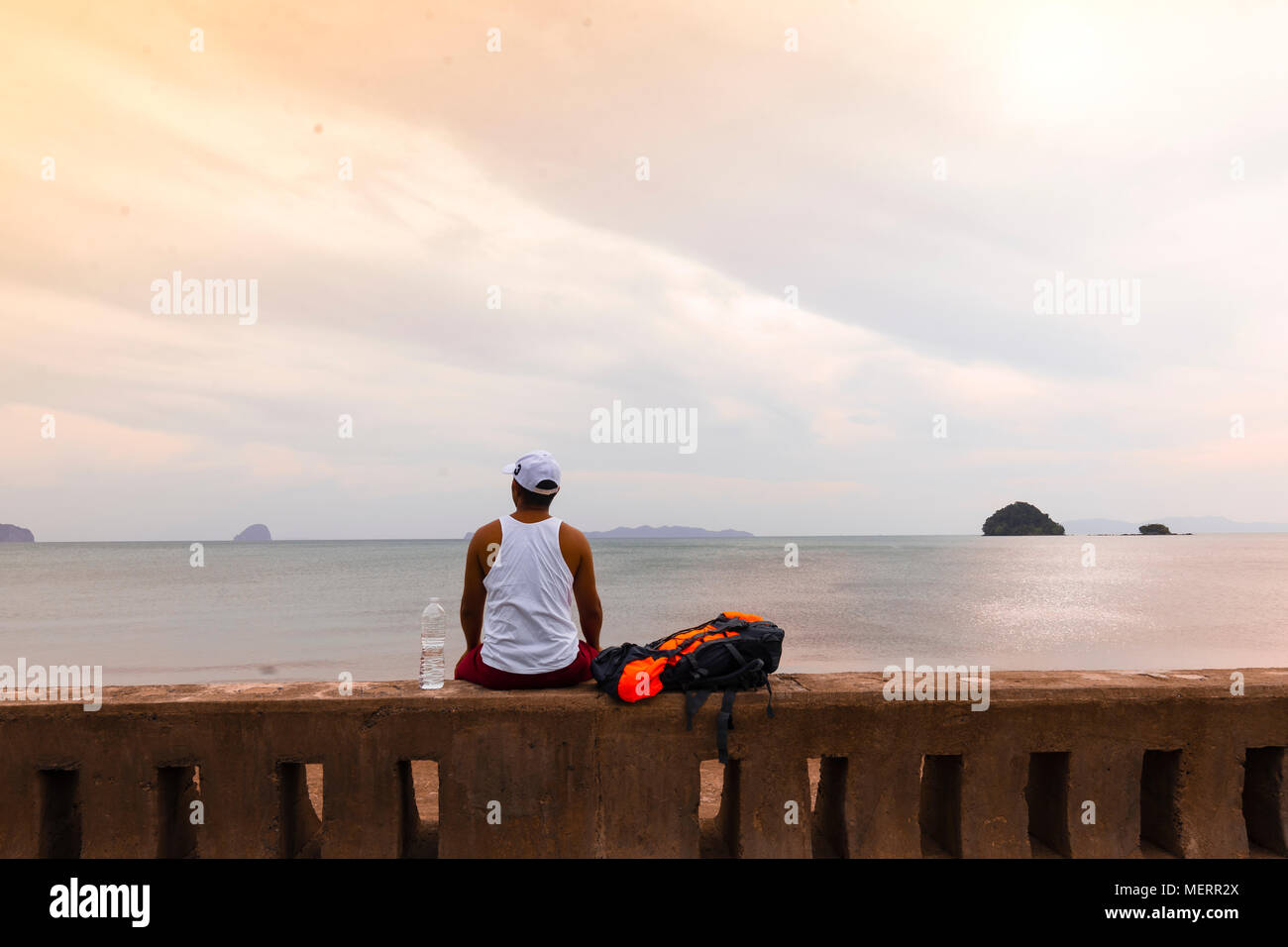 Backpacker looking sea view,Asian backpack looking the beach Stock ...