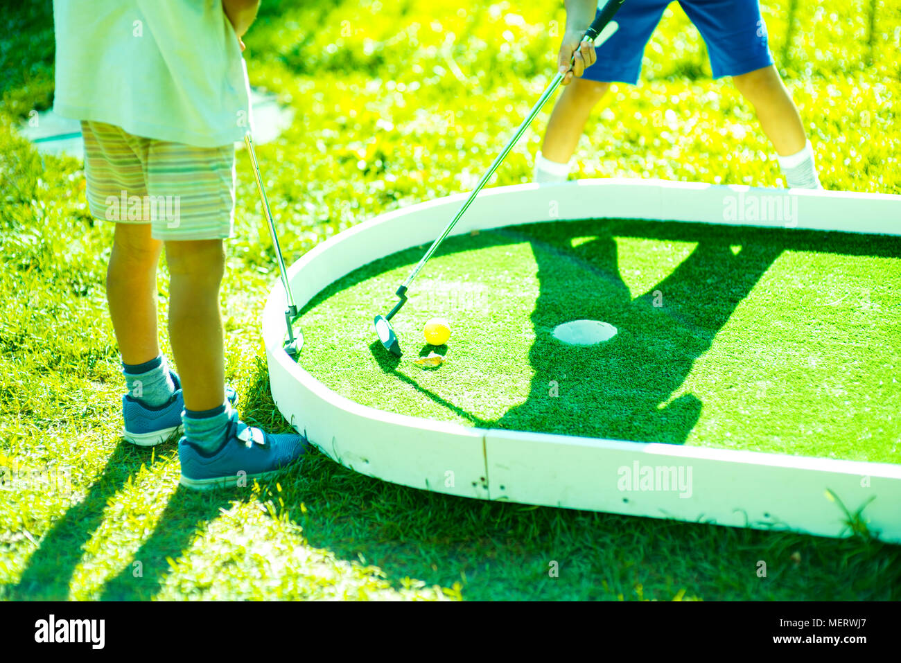 Boy on golf course hi-res stock photography and images - Alamy