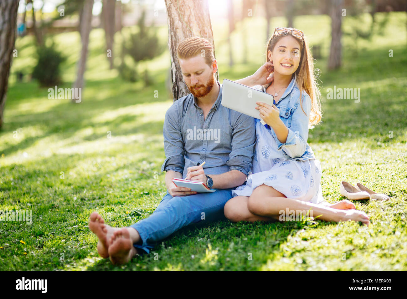 Cute university students studying Stock Photo - Alamy