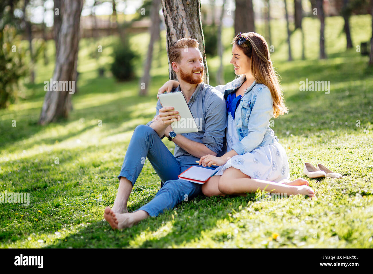 Cute university students studying Stock Photo - Alamy