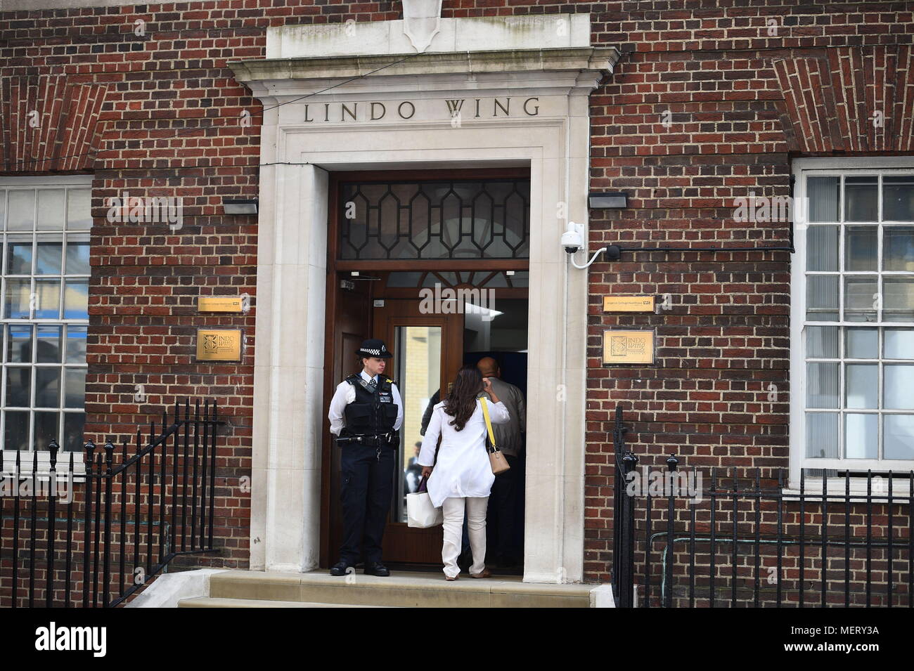 A police officer stands outside the Lindo Wing of St Mary's Hospital in ...