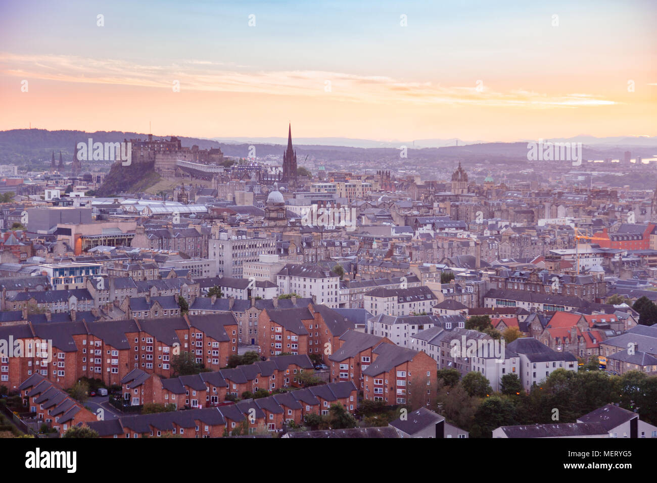 Edinburgh cityscape with Edinburgh Castle in background at sunset as ...