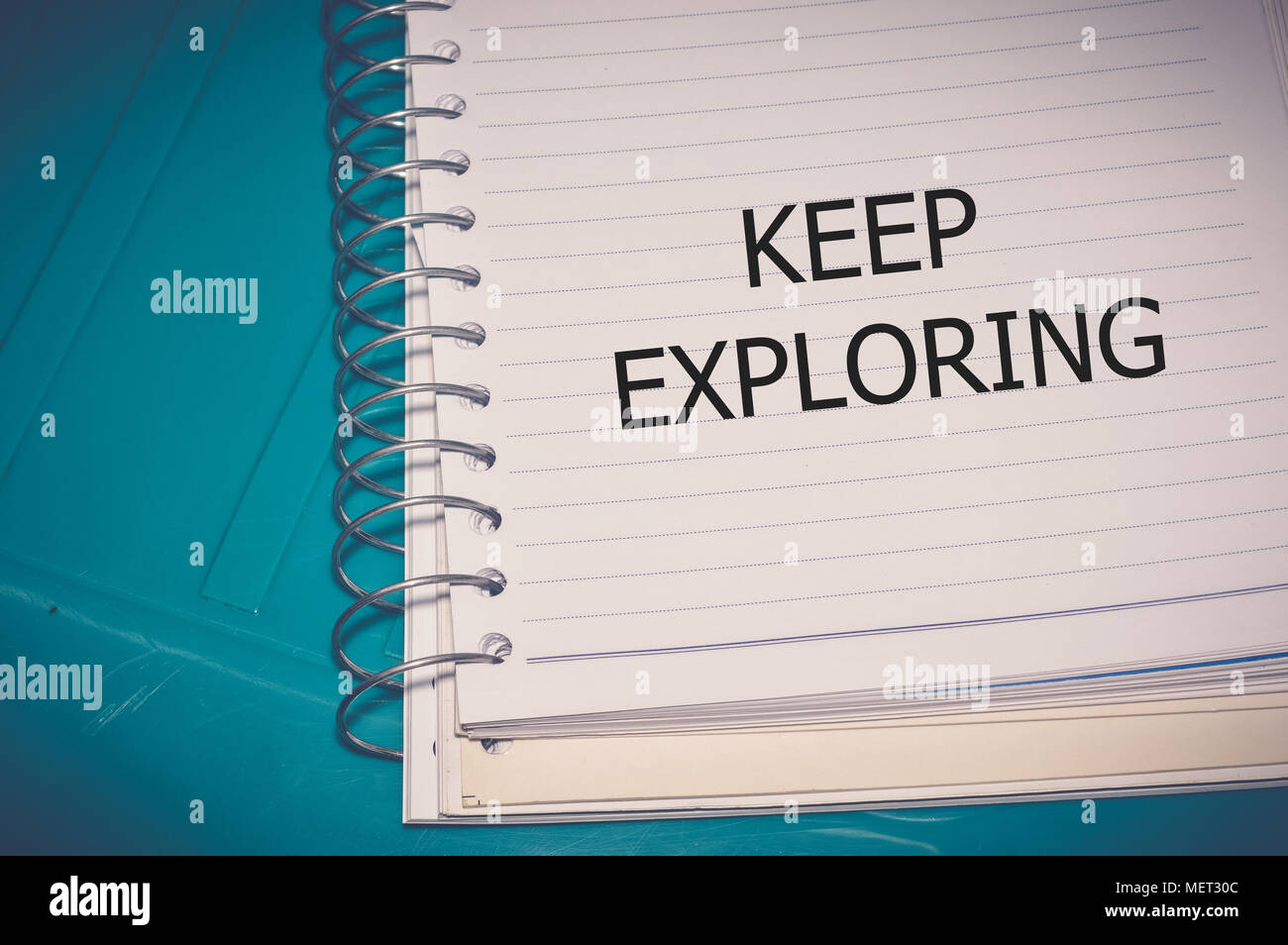 Keep exploring word written on white paper Stock Photo - Alamy