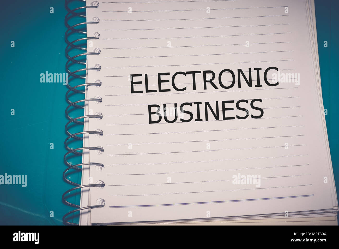 electronic business word written on white paper Stock Photo - Alamy