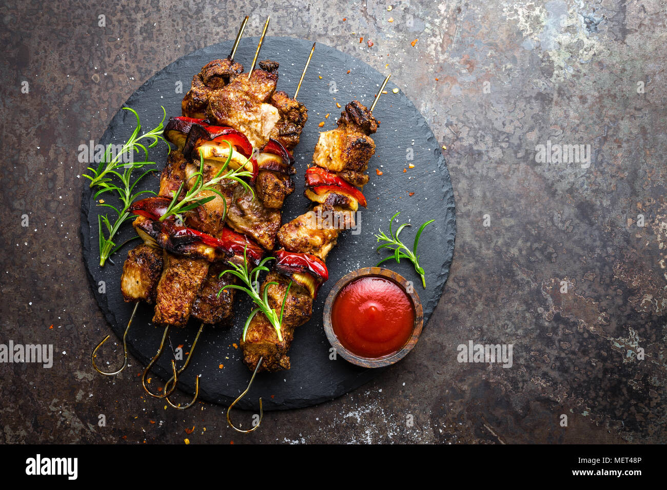 Grilled meat skewers, shish kebab with onion and sweet pepper Stock ...