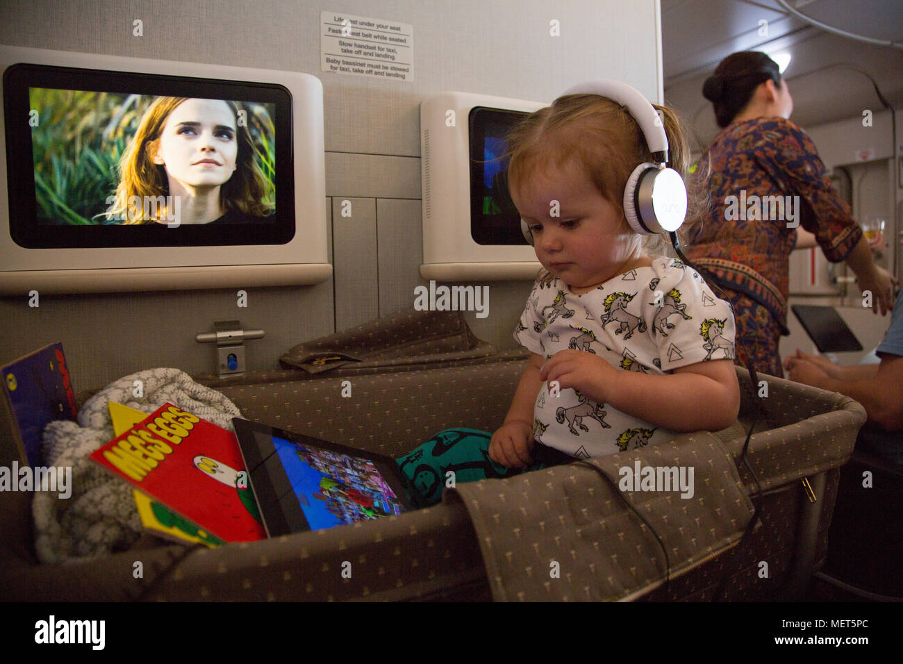 Girl watching plane hi-res stock photography and images - Alamy
