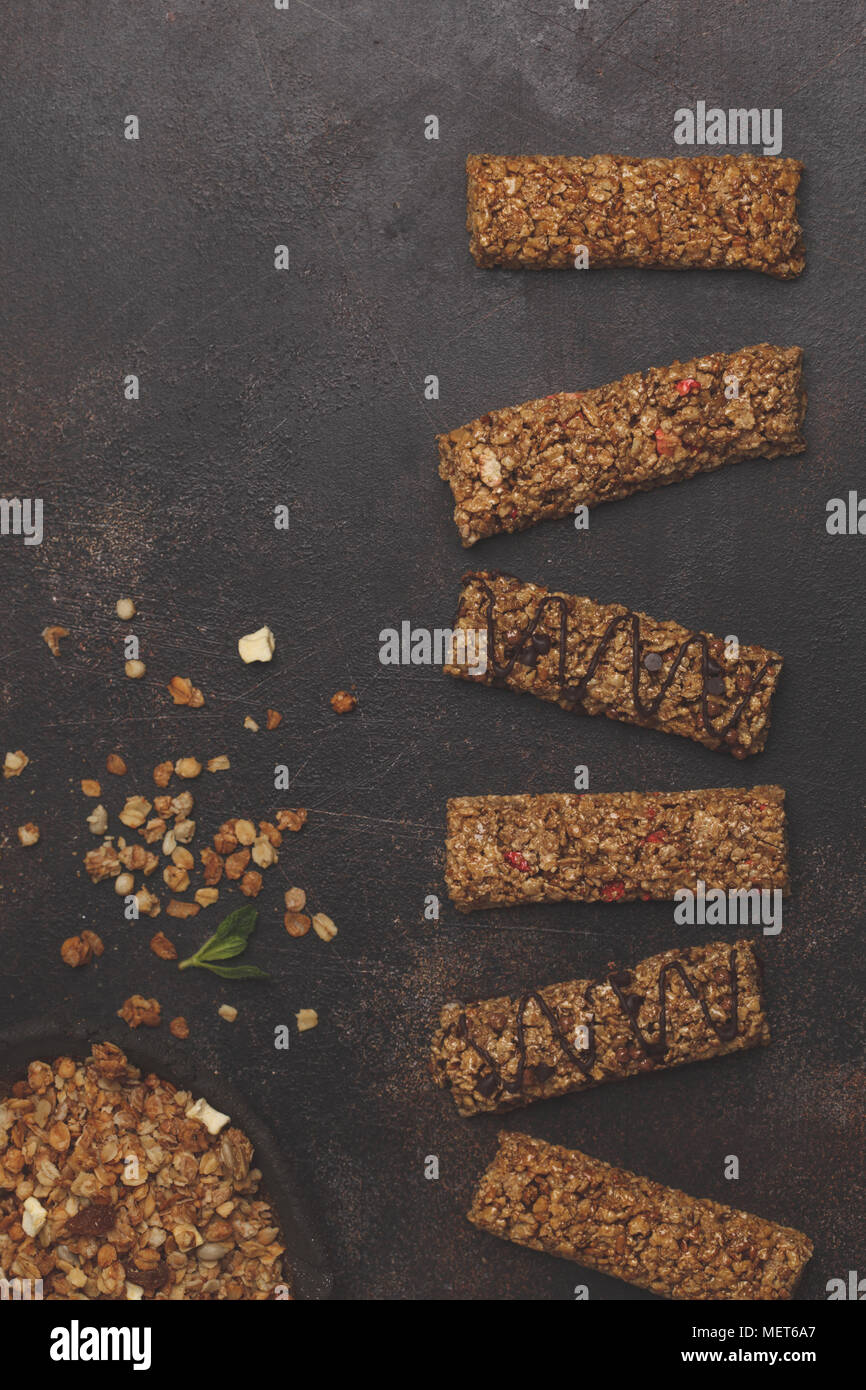 Granola bars and ingredients. Healthy sweet dessert snack. Cereal ...