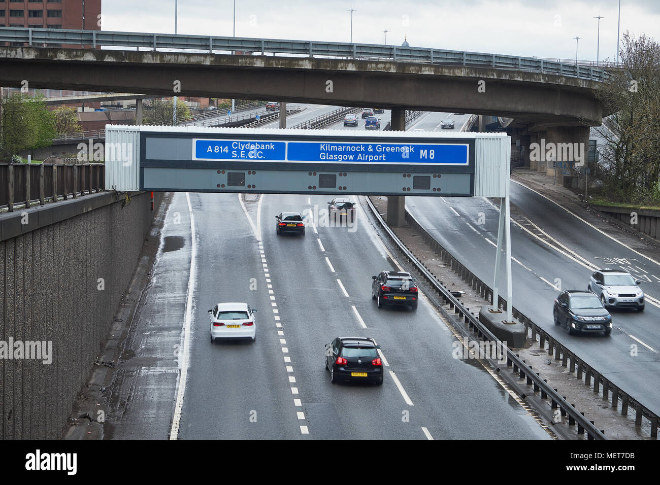 UK motorway signs on overhead gantry - junction 17 of the M8 Glasgow ...