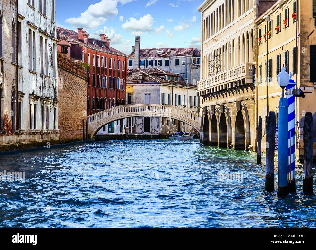 Boat in Canal Under Bridge in Venice Stock Photo - Alamy