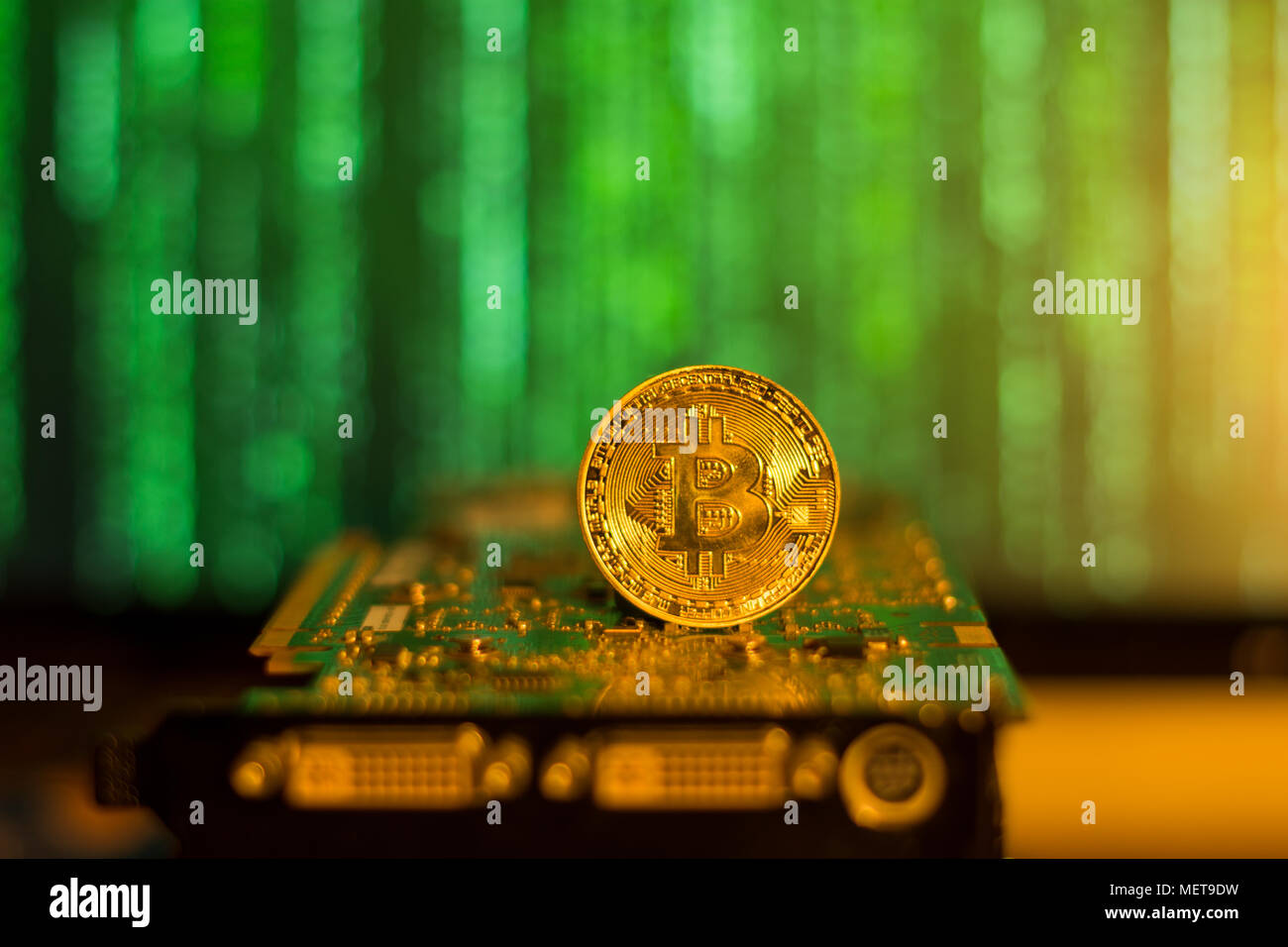 Bitcoin mining graphic card on a blurry matrix background Stock Photo ...