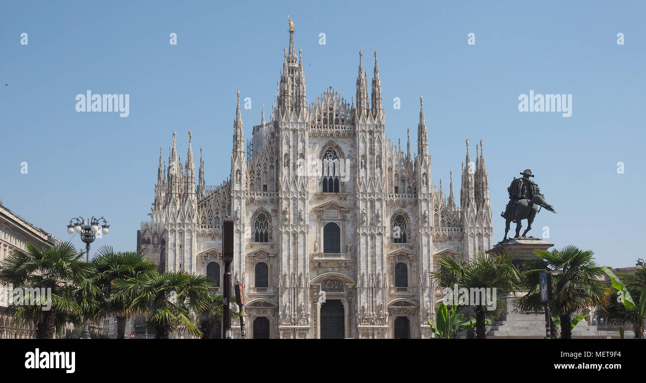 Duomo di Milano (meaning Milan Cathedral) church with palm trees in ...