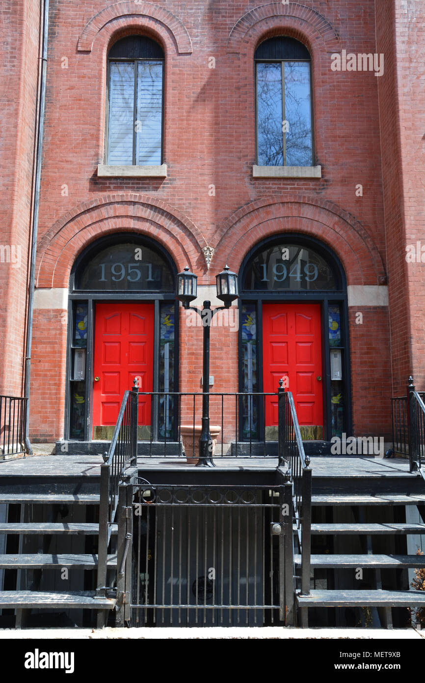 A pair of red doors to a vintage apartment building in Chicago's ...