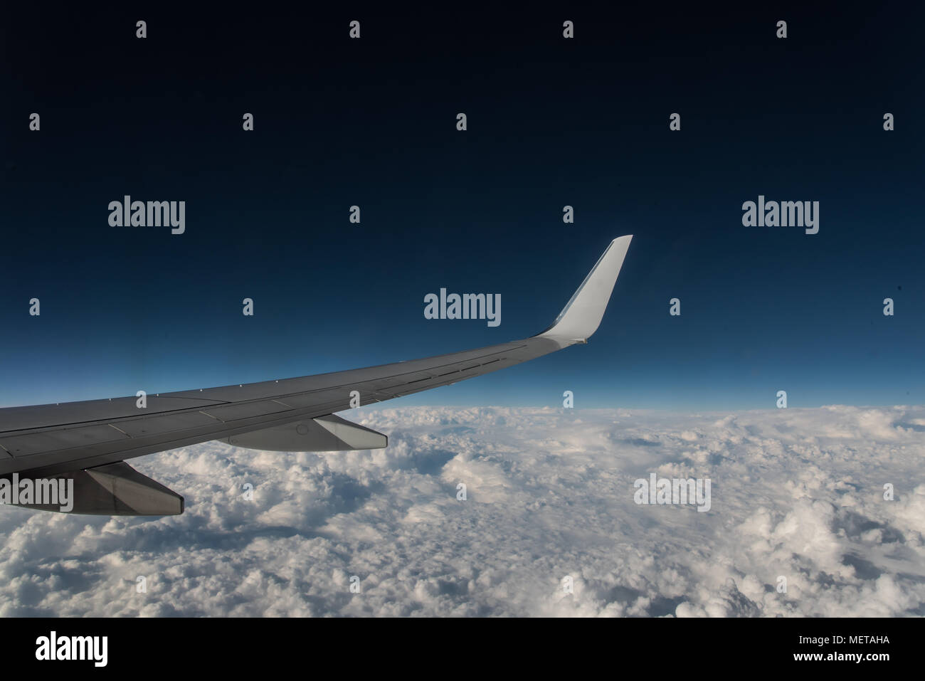 Jetliner Wing Over Clouds Stock Photo - Alamy