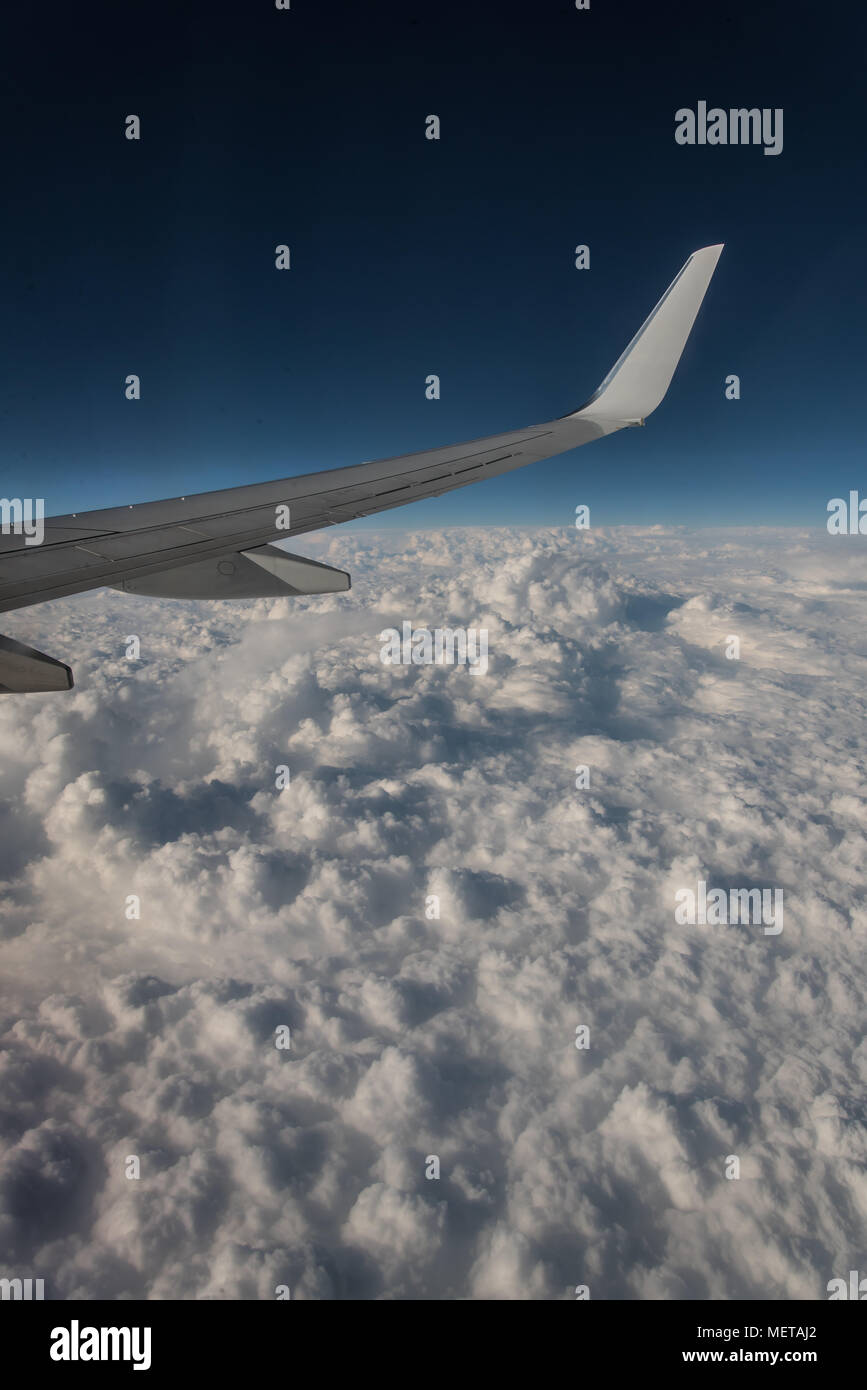 Jetliner Wing Over Clouds Stock Photo - Alamy