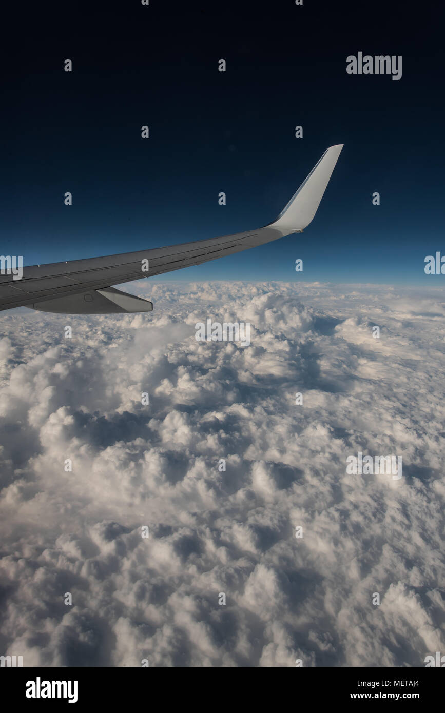 Jetliner Wing Over Clouds Stock Photo - Alamy