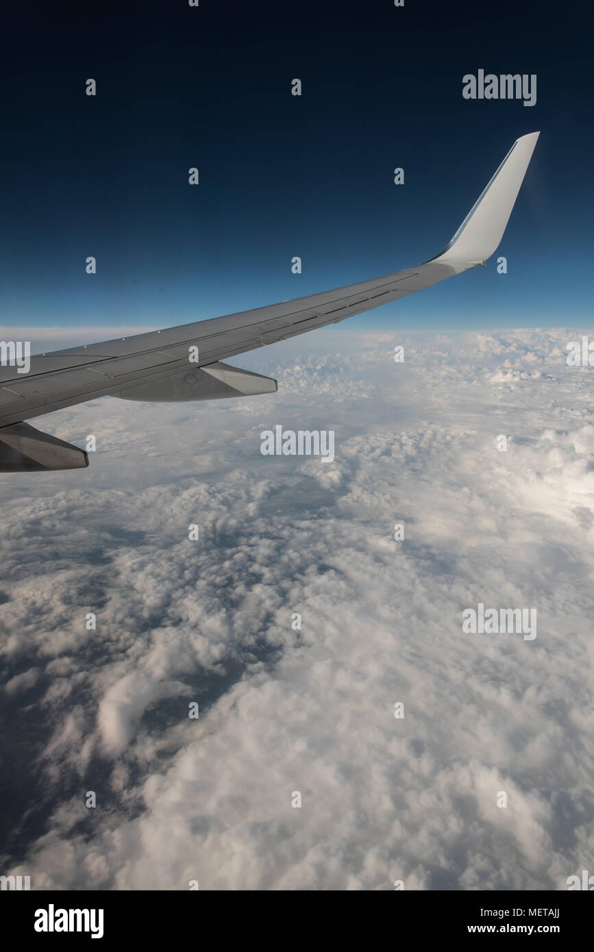 Jetliner Wing Over Clouds Stock Photo - Alamy