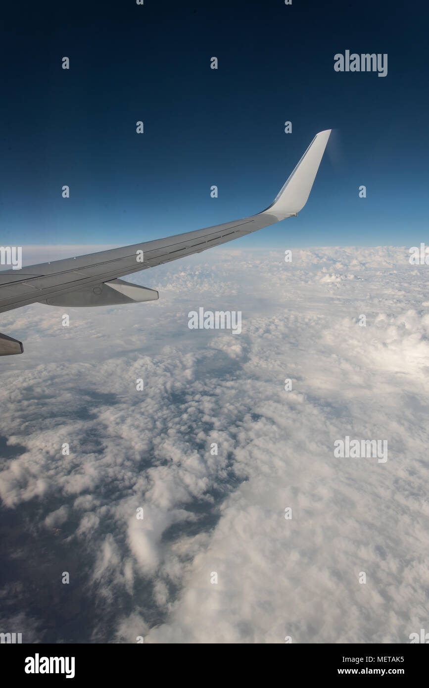 Jetliner Wing Over Clouds Stock Photo - Alamy