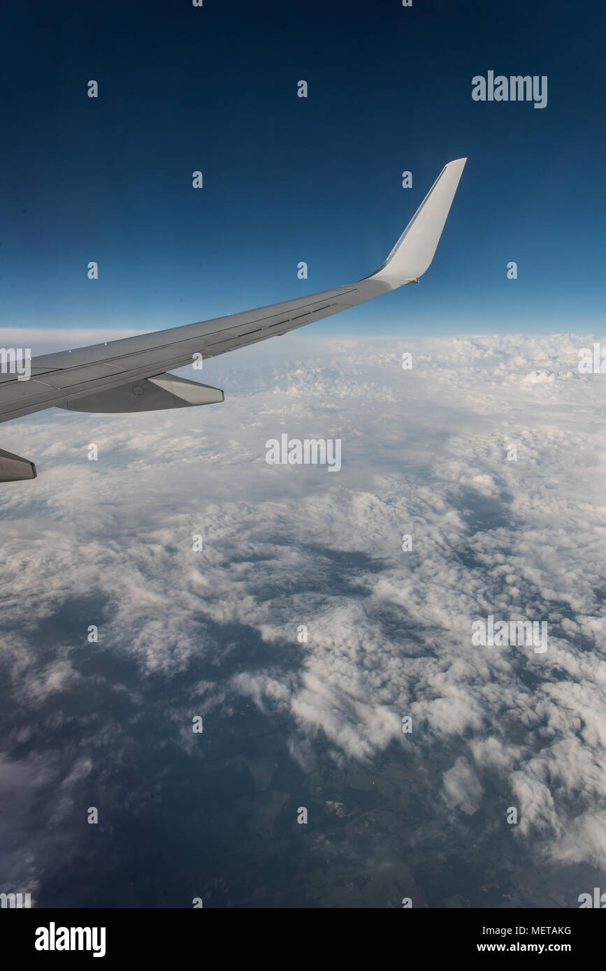 Jetliner Wing Over Clouds Stock Photo - Alamy