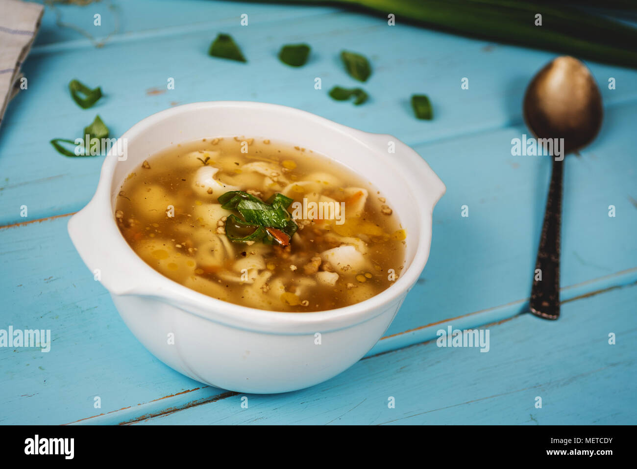 Traditional czech homemade soup with pasta shell named french soup ...