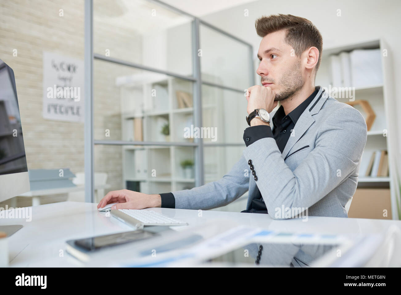 Confident young project manager hi-res stock photography and images - Alamy