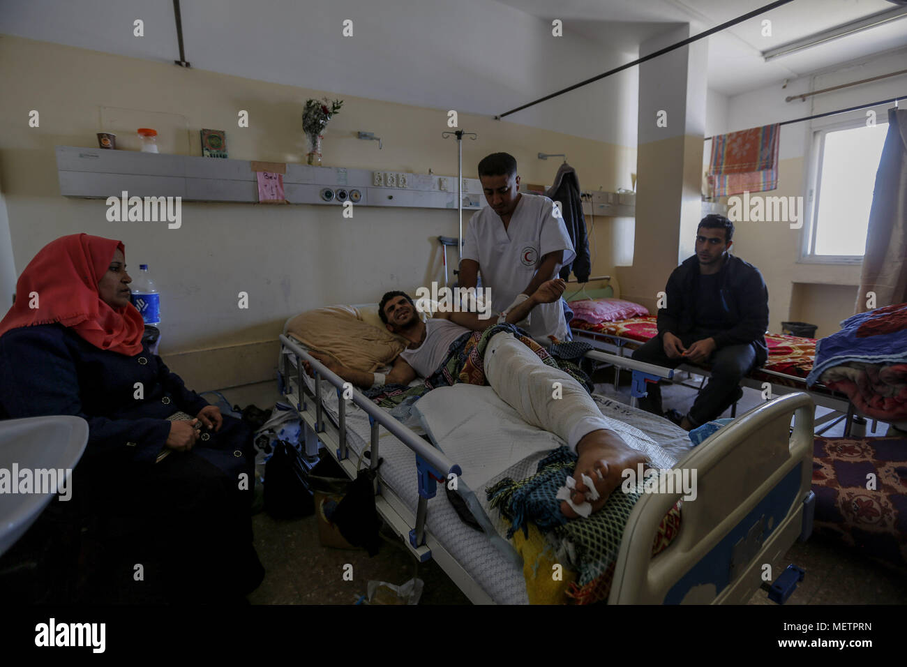Gaza City, Gaza Strip. 23rd Apr, 2018. A wounded Palestinian man ...