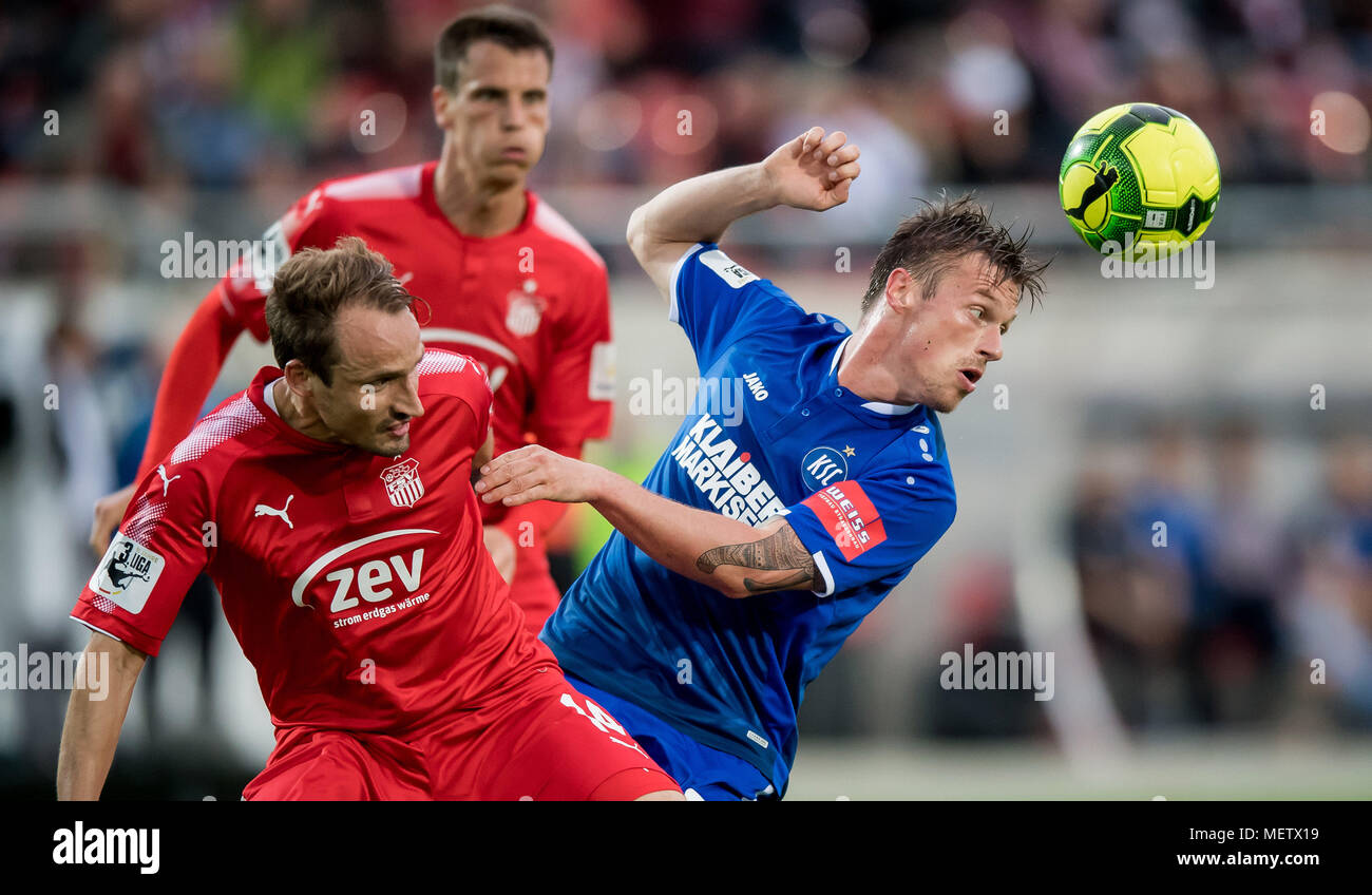 Zwickau, Deutschland. 23rd Apr, 2018. Marvin Pourie (KSC) versus Toni ...
