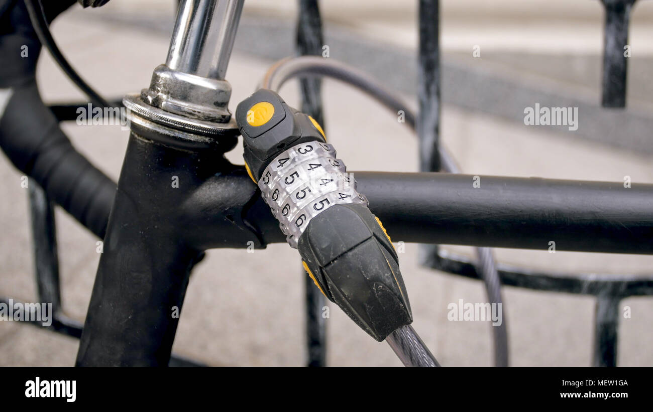 Closeup photo of combination lock on old vintage bicycle locked to ...