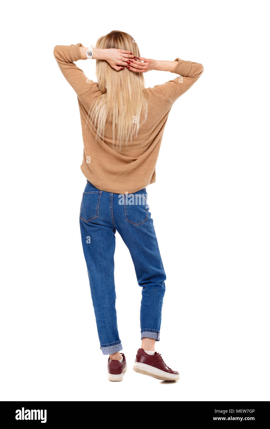 Back view of a woman standing. girl watching. Rear view people ...