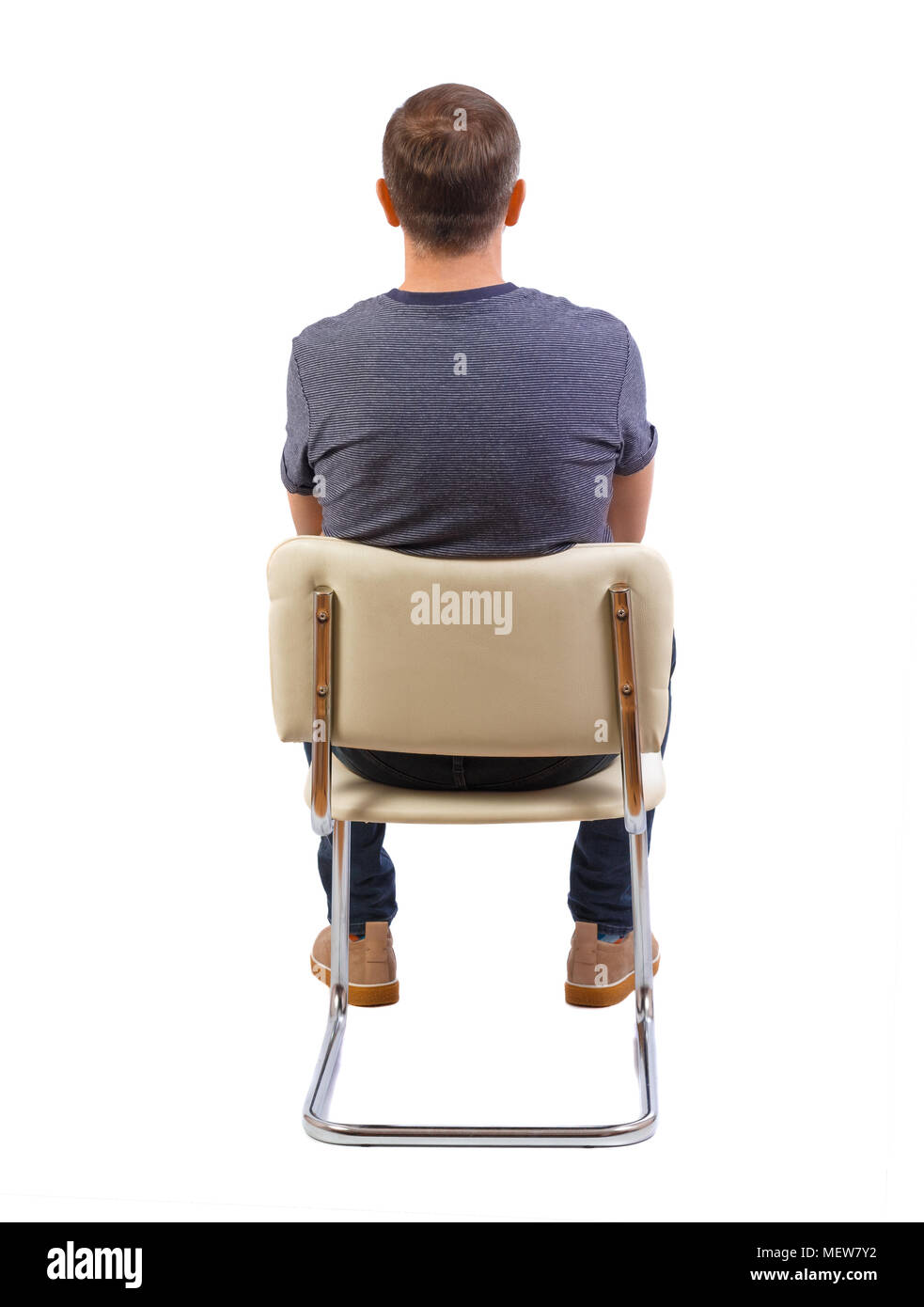 Back view of a man sitting on a chair. Rear view people collection ...