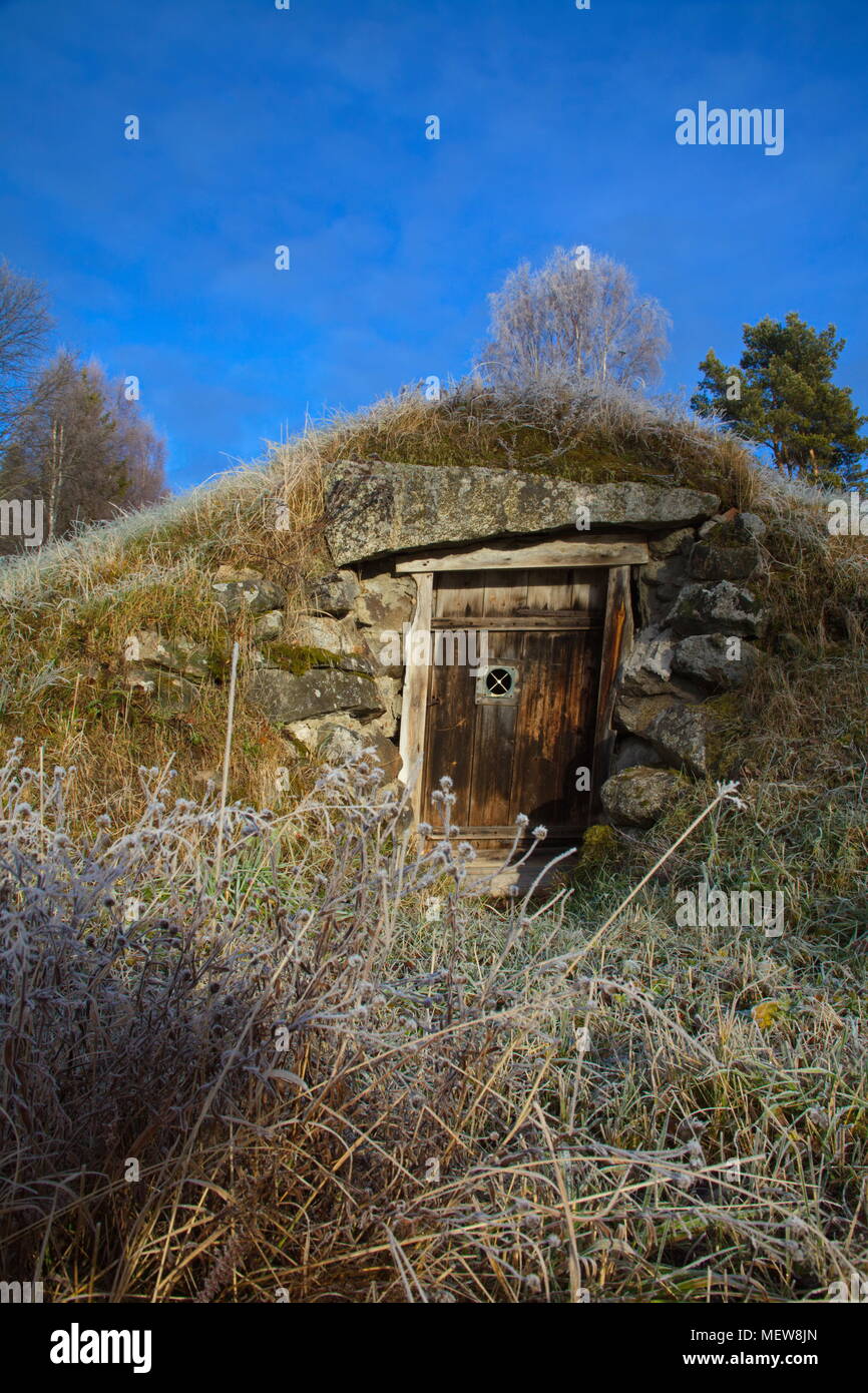 Wooden door to a traditional root cellar used for storing food supplies ...