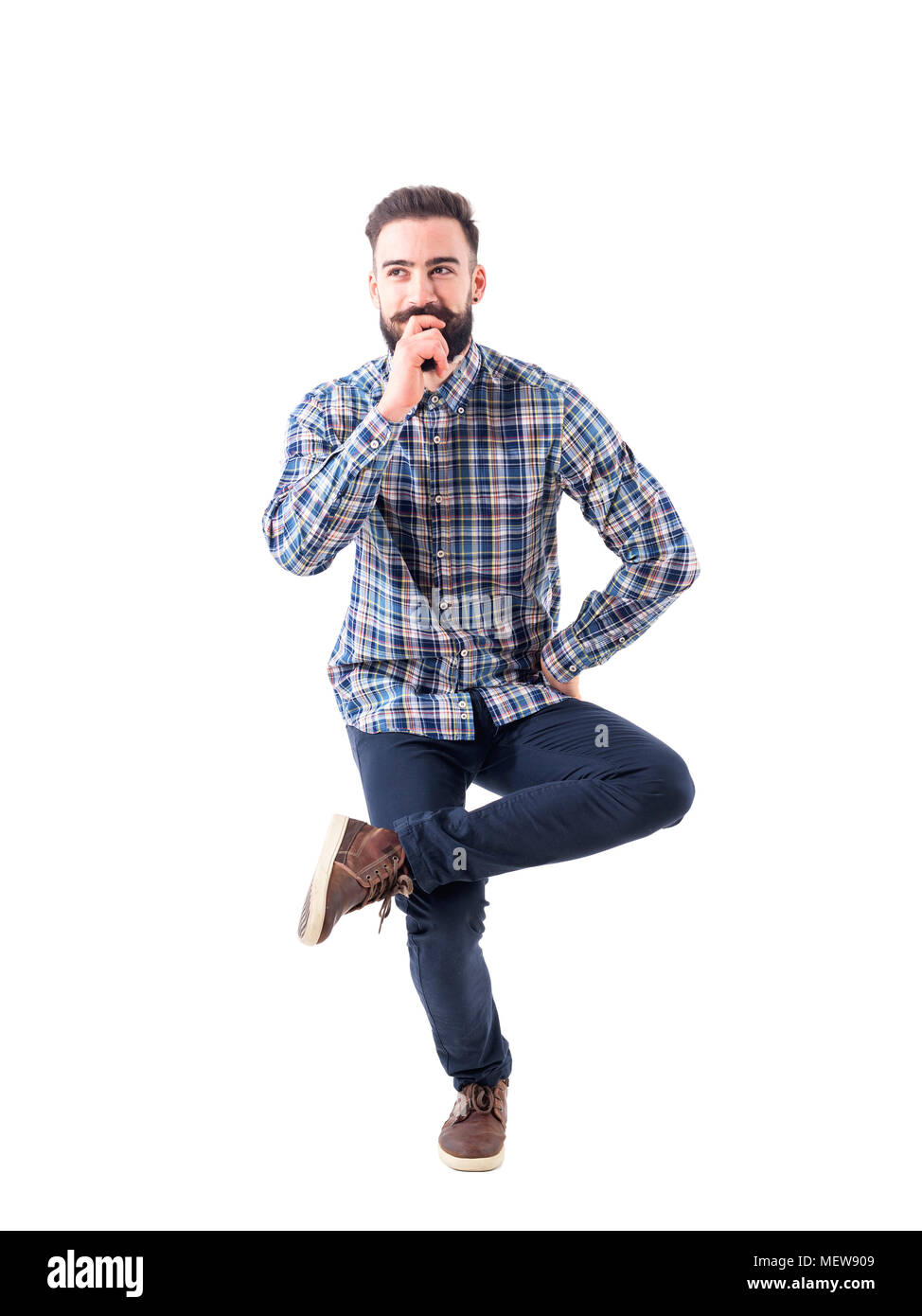Funny charming bearded young man sitting in mid air on one leg. Full ...