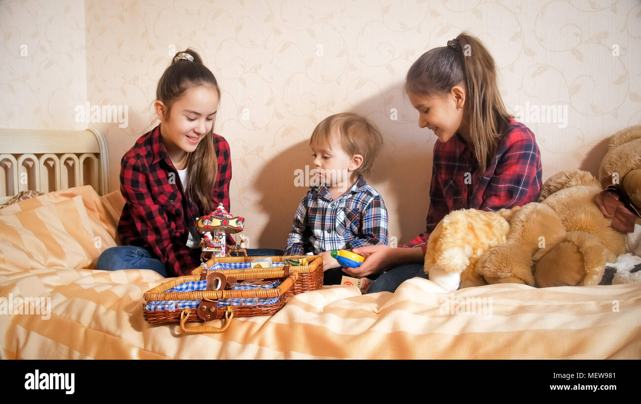 Girl Looking After Baby Brother High Resolution Stock Photography and ...