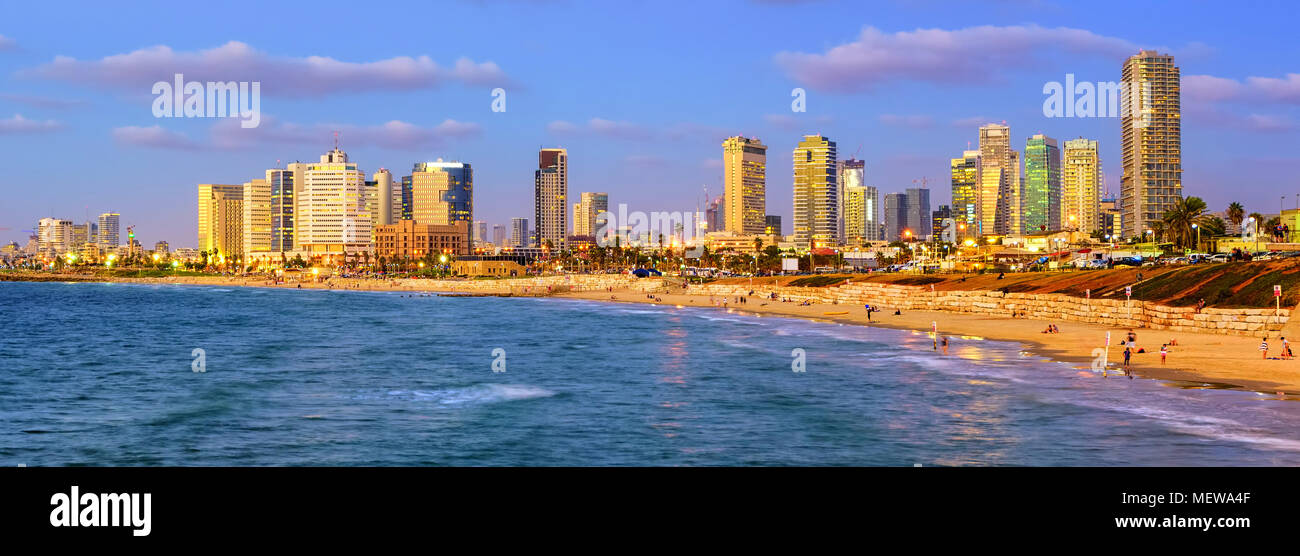 Modern skyline and sand beaches of Tel Aviv city on sunset, Israel ...