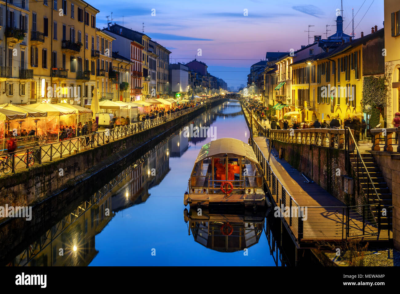 Milan city, Italy, Naviglo Grande canal is a popular illuminated in the ...