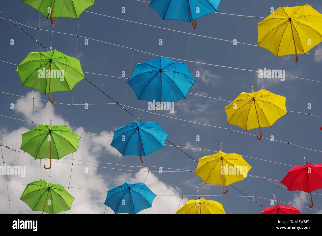 The Exeter Riddle and Colourful Spring Umbrellas. Exeter High Street ...