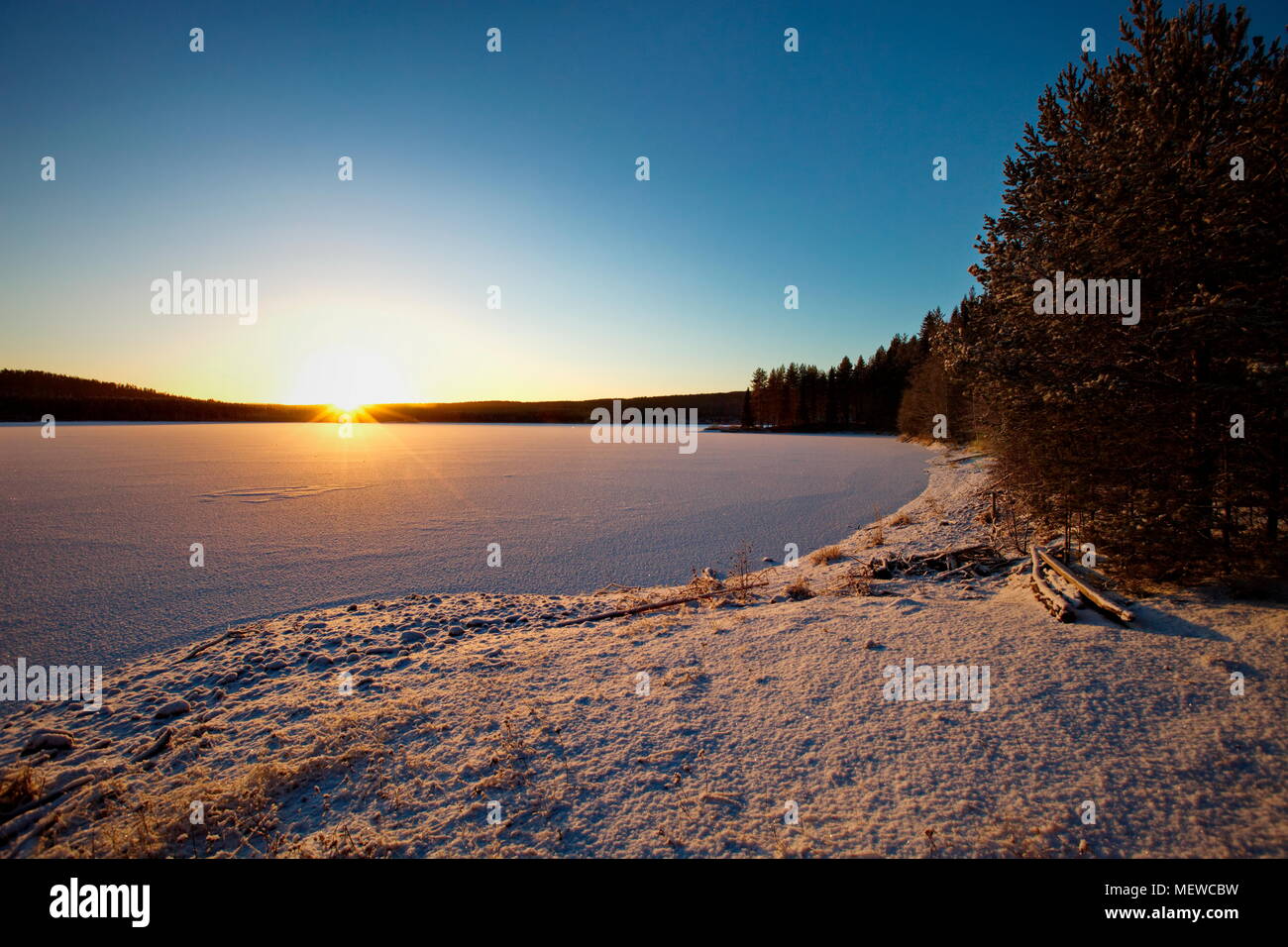 Ice covered lake at sunrise hi-res stock photography and images - Alamy