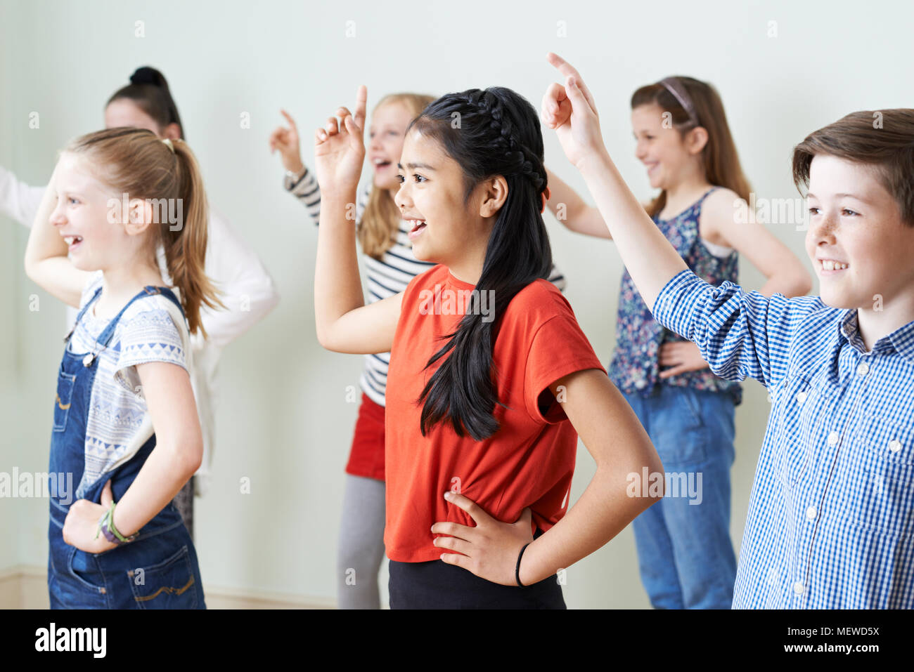 Group Of Children Dancing In Drama Class Together Stock Photo - Alamy